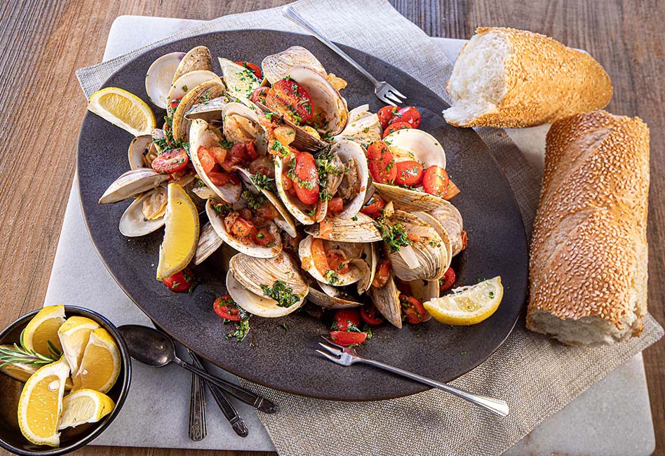 Tropical Tide: Garlic-Lemon Steamed Clams with Tomato